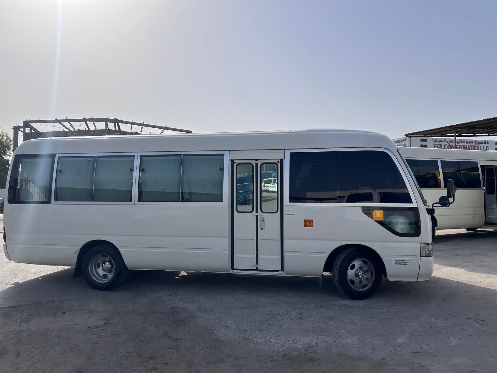 30-Seater Toyota Coaster Bus Rental Dubai | Small Staff Bus Rent